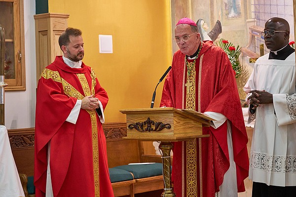 Bishop installs Father Osborn as pastor of Middletown parish ...